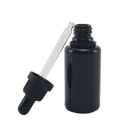 China 10ml 30ml Cosmetic Black Glass Dropper Bottle With Screw Cap for sale