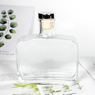 China Transparent 300ml 500ml Empty Glass Wine Bottles Embossing Electroplating for sale
