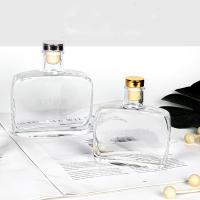 China Transparent 300ml 500ml Empty Glass Wine Bottles Embossing Electroplating for sale