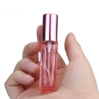 China Luxury 10ml 30ml Empty Cosmetic Glass Bottles Pink Glass Perfume Bottles for sale