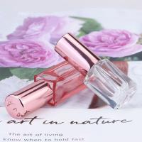 China Luxury 10ml 30ml Empty Cosmetic Glass Bottles Pink Glass Perfume Bottles for sale