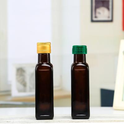 China Square 100ml Brown Glass Olive Oil Bottle With Plastic Cover for sale