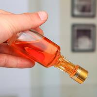 China Carton Packing Square 50ml Empty Glass Wine Bottles Embossed With Screw Cap for sale