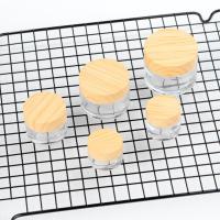 China Frosted Skincare Cosmetic Glass Bottles 15g 30g Glass Cream Jar With Bamboo Lid for sale