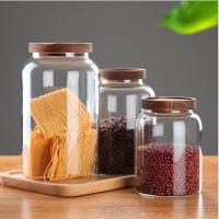 China 1300ml 2000ml 2800ml Borosilicate Empty Glass Jars With Wood Lid for sale