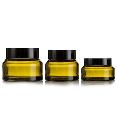 China 30g 50g Slant Shoulder Cosmetic Glass Jars Hot Stamping Glass Eye Cream Jar for sale