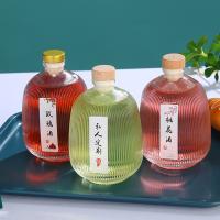 China Vertical Stripe Empty Glass Wine Bottles 375ml 500ml Plum Wine Bottle With Corks for sale
