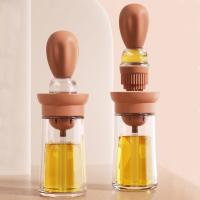 China Silicone Brush Lid Empty 180ml Glass Olive Oil Bottle For Kitchen Cooking for sale