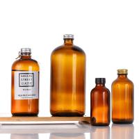 China Round Glass Drink Bottles 750ml 1000ml Empty Clear Boston Glass Bottles for sale