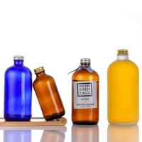 China Round Glass Drink Bottles 750ml 1000ml Empty Clear Boston Glass Bottles for sale