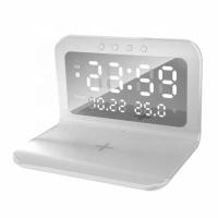 China Oem  Qi Standard Wireless Phone Charger Alarm Clock With Charging Pad  Powerful for sale
