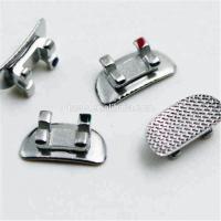 China Stainless Steel Hot Dental Ortodoncia Orthodontic Molar Bracket Slot 0.022 Roth Bracket with 80 Gauge Mesh Base Shelf Life 2 Years for sale