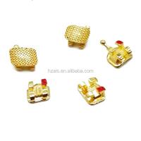 China Class II ALS Orthodontic Bracket Lingual Dental Golden Coated Brace Customized for sale