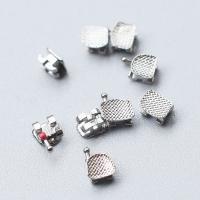 China Precision Metal Orthodontic Bracket Self Adjusting Braces For Edgewise Tooth Movement Control for sale