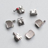 China Precision Metal Orthodontic Bracket Self Adjusting Braces For Edgewise Tooth Movement Control for sale