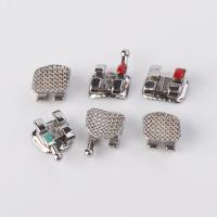 China Precision Metal Orthodontic Bracket Self Adjusting Braces For Edgewise Tooth Movement Control for sale