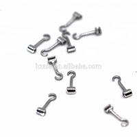 China CCC Certification metal button lingual round/ elliptical 10pcs per pack for dental orthodontic procedures made of metal for sale
