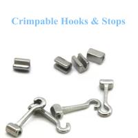 China Class II Instrument Classification 10pcs/bag Bondable Sliding Crimpable Hook Left or Right for Dental Orthodontic Products for sale
