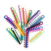 China Bicolor Latex Free Orthodontic Elastic Ligature Ties with 20 Sticks per Pack for Secure Archwire Engagement for sale