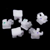 China High Performance Ceramic Self Ligating MBT Brackets 0.022 0.018 WH For Efficient Tooth Movement for sale