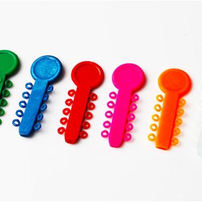 China V Slot Ligature Tie for Orthodontic Braces 100 Pack for sale