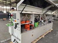 China 10-60mm Panel Thickness Pvc Mdf Edge Banding Machine  For Panel Width 50mm Manufacturing for sale