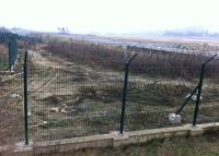 China 2.3m Height 76*12mm Mesh Curved Welded 358 Anti Climb Fence Pvc Coated for sale