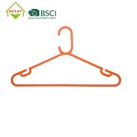 China Ergonomic Orange Plastic Tube Hangers Notched Shoulders for sale