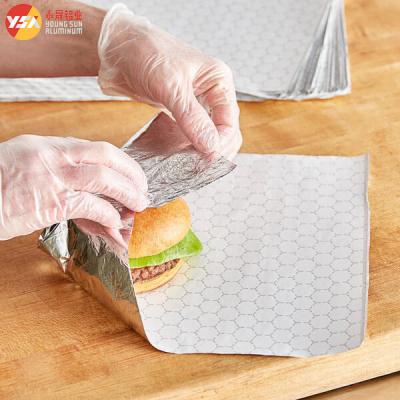 China Hexagon Honeycomb Paper Laminated Aluminum Foil Burger Wrapping 1000 Sheets for sale