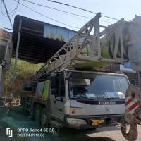 China Zoomlion's 2016 Orange Truck Crane 55 Ton Lifting Capacity Folding Design Orange Color for sale