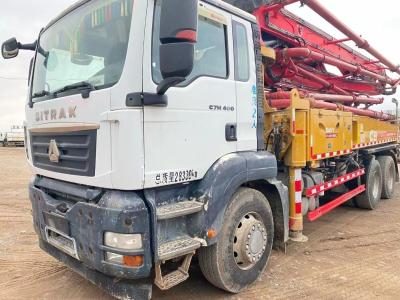 China Shandeka chassis above the 16 year trinity pump car concrete pump truck with boom for sale