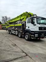 China Zoomlion's 56-meter concrete pump truck is equipped with German Shandeka chassis, specially built for high-rise buildings and large projects. for sale
