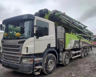 China Used 2018 Zoomlion 63m concrete pump truck with Scania chassis, showing discounted price for sale for sale