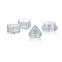 China PS Base Material 4ml Mini Cream Jar with Lid Portable Plastic Clear Jar Flower Shape for sale