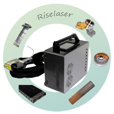 China Lightweight 100w 50w Laser Rust Removal Machine Air Cooling Backpack Portable for sale