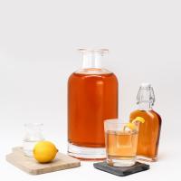 China Glass Body Material Transparent Liquor Spirit Bottle with Cork Custom 500ml 750ml Bottles for sale