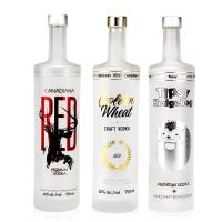 China 750ml 700ml Chicago Style Glass Wine Bottle with Wooden Cork Cap and Customized Logo for sale