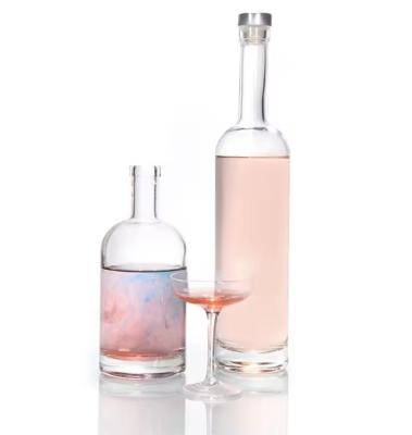 China 200ml 375ml 500ml 750ml 1000ml round glass liquor bottle with cork lid and custom design for sale