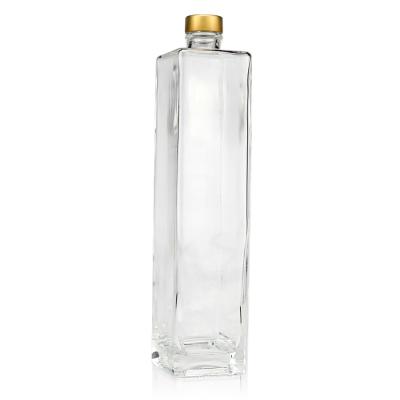 China Electroplating 750ml Gold Cork Top Rectangle Vodka Wine Glass Bottles for Liquors for sale