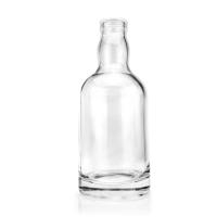 China Customized Logo Shape Closures 750ml Empty Unique Glass Bottle For Liquor With Cap for sale