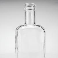 China 700ml Clear Flat Square Glass Vodka Whiskey Bottle with Screw Cap and Engraving Logo for sale