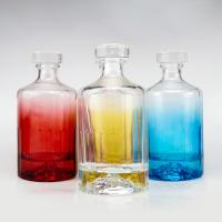 China Whisky 500ml Creative Design Glass Bottle With Red Volcanic Bump Bottom and Glass Cork for sale