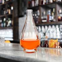 China Engraving Surface Handling Empty Soda Drink Juice Glass Bottle for End Mineral Water for sale