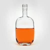 China Hot Stamping 500Ml Empty Square Shoulder Glass Vodka Bottle With Screw Cap For Liquors for sale