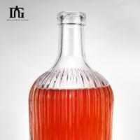 China Logo Acceptable 700ml Clear Glass Vodka Bottle with Cork and Screw Cap for sale