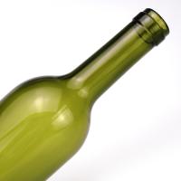 China 750ml Prime Color Glass Bottle for Red Wine Spirits Round Shape Green Color Cork Screw Cap for sale