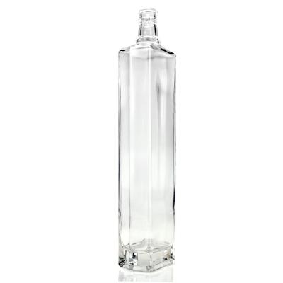 China Acceptable Customer's Logo Glass Bottle Shaped Triangle 650ml Liquor Whisky with Cork for sale