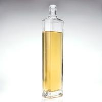 China Acceptable Customer's Logo Glass Bottle Shaped Triangle 650ml Liquor Whisky with Cork for sale