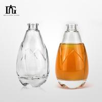 China Provided Freely Super Flint Color Crystal White Glass Bottles for Brandy and Vodka with Cork for sale