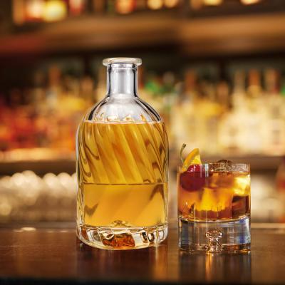 China 500ml/700ml/750ml Vodka Glass Bottles with Corked Cap and Twill Carved Design for sale